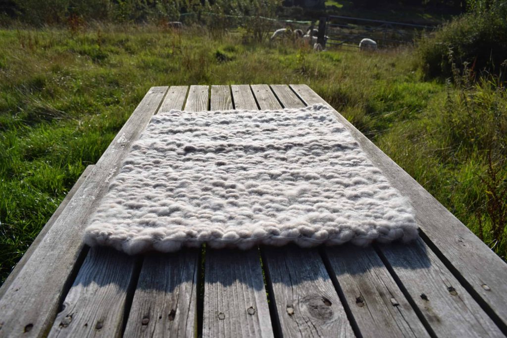 Peg Loom Natural Wool Rug 'Torddu' - Handmade in Wales - Patchwork Sheep